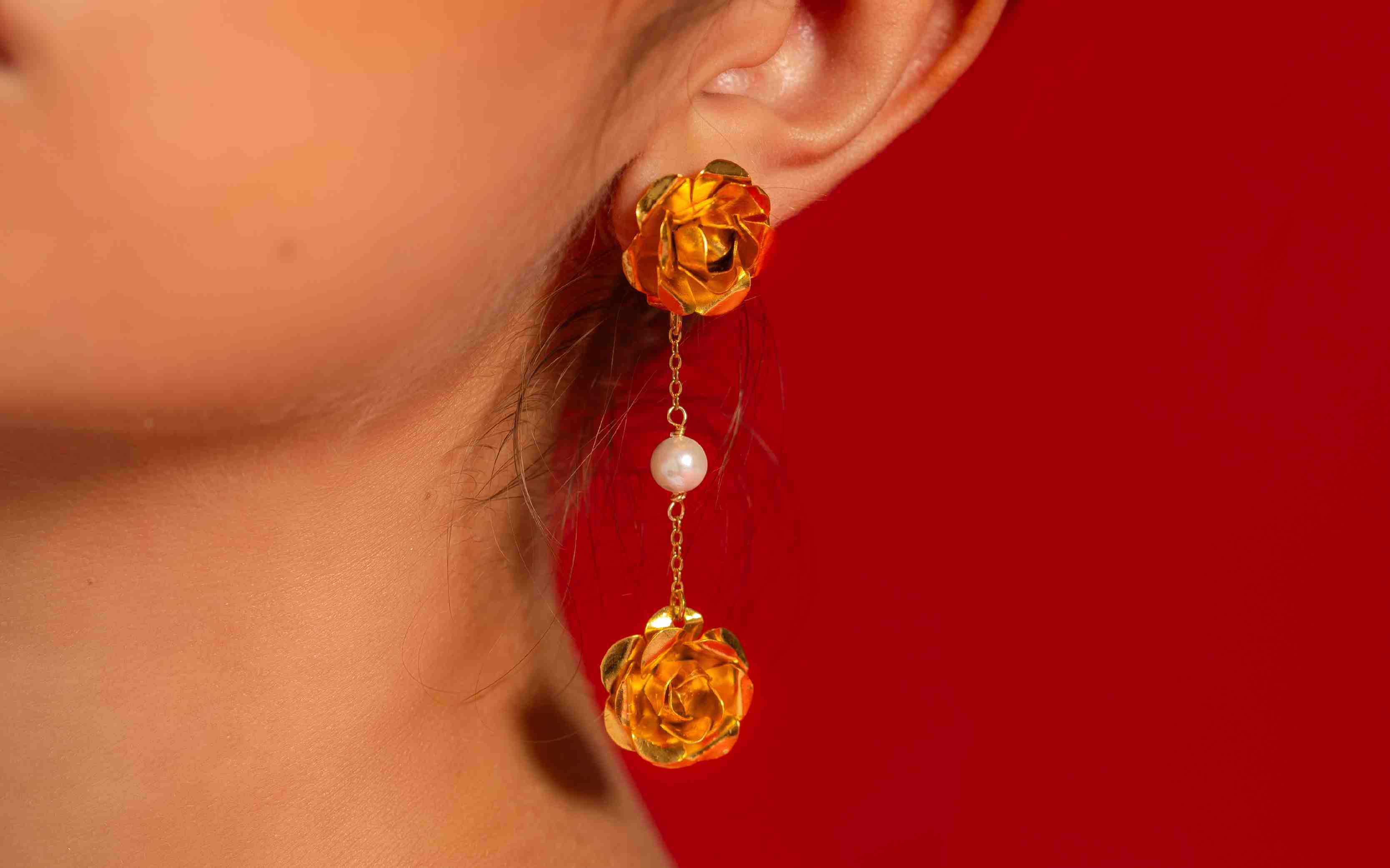 La historia y evolución de los aretes en la moda – ENIGMA Joyería